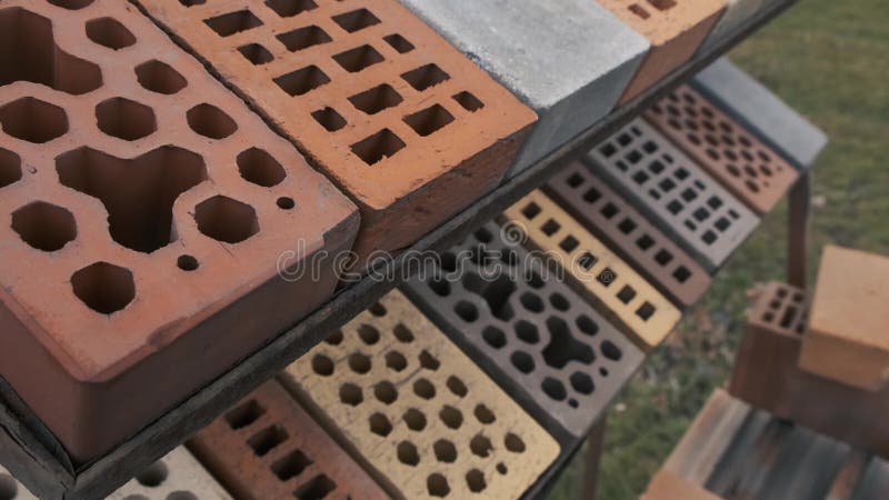 Samples of Bricks Differ in Shape and Color Displayed in a Row at the ...