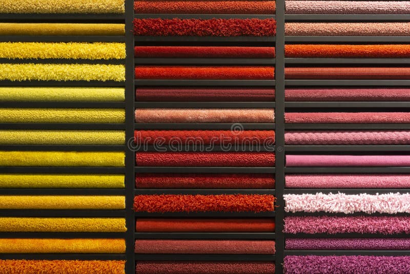 Samples of Carpets of Different Colors on a Stand in a Store or ...