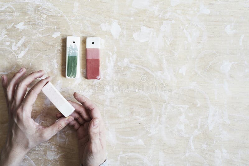 Samples of Colored Enamel for Color Ceramic in Hands, Working Process ...