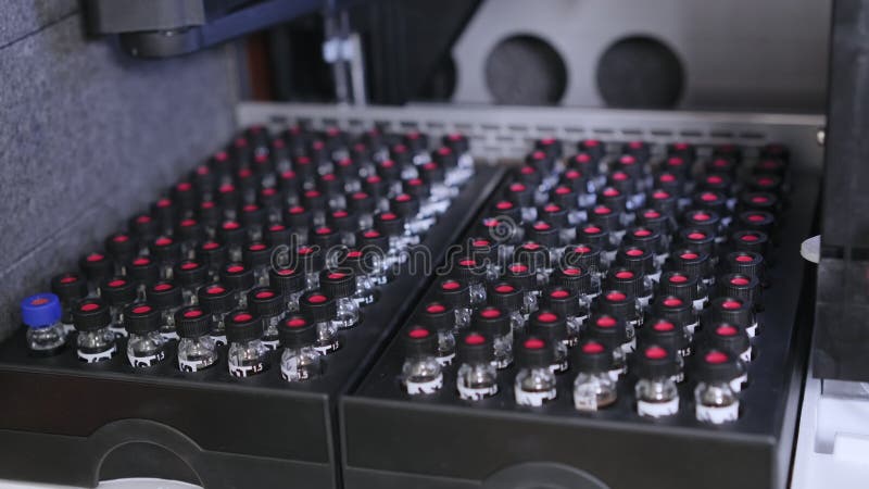 Samples in Glass Vials with Black Caps Waiting for Analysis in the Auto ...