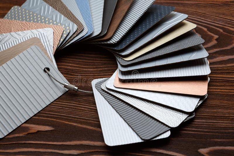 Samples of Metal Laminate Laid Out in the Form of a Circle on a Brown ...