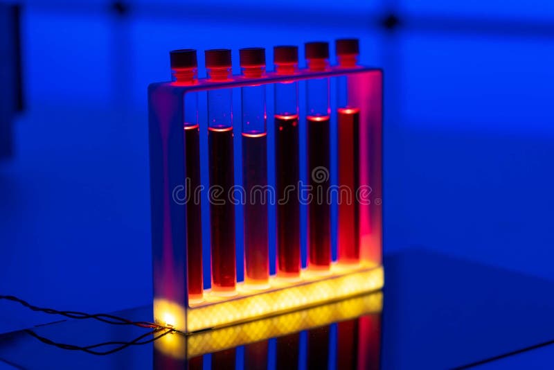 Samples of Radioactive Liquid in Test Tubes in a Nuclear Physics ...