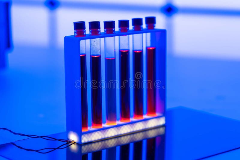 Samples of Radioactive Liquid in Test Tubes in a Nuclear Physics ...