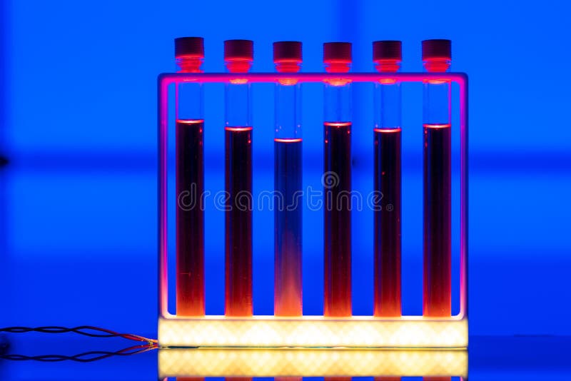 Samples of Radioactive Liquid in Test Tubes in a Nuclear Physics ...