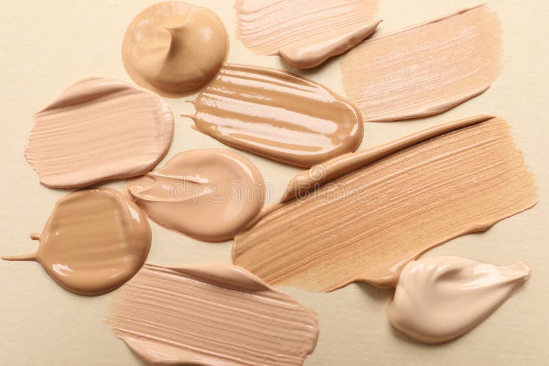 Samples of Skin Foundation on Beige Background, Closeup Stock Image ...
