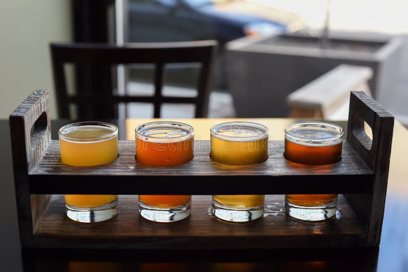 Sampling Local Seasonal Beer Stock Photo - Image of cider, drinks ...