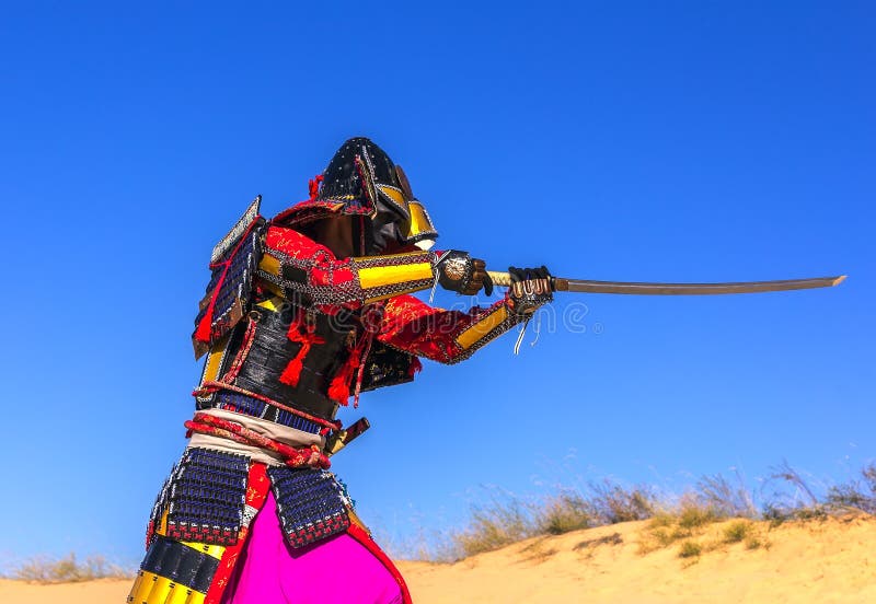Samurai in Ancient Armor, with a Sword in an Attack Stock Photo - Image ...