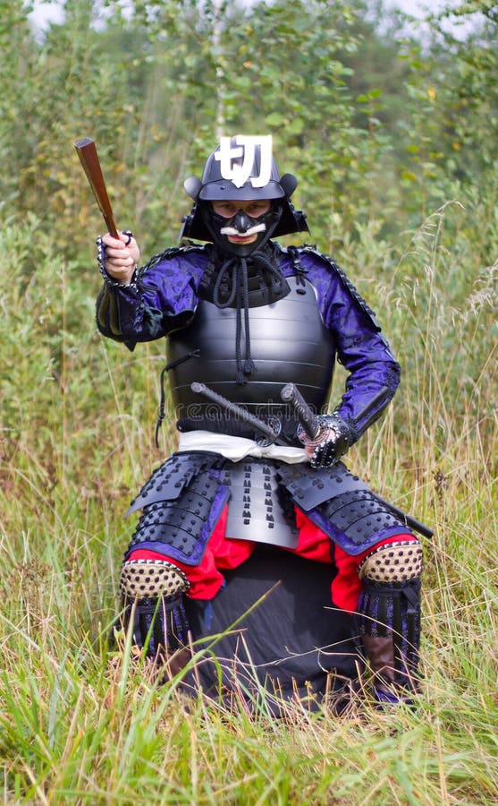 Samurai in Armor Showing Direction by Folded Fan Stock Image - Image of ...