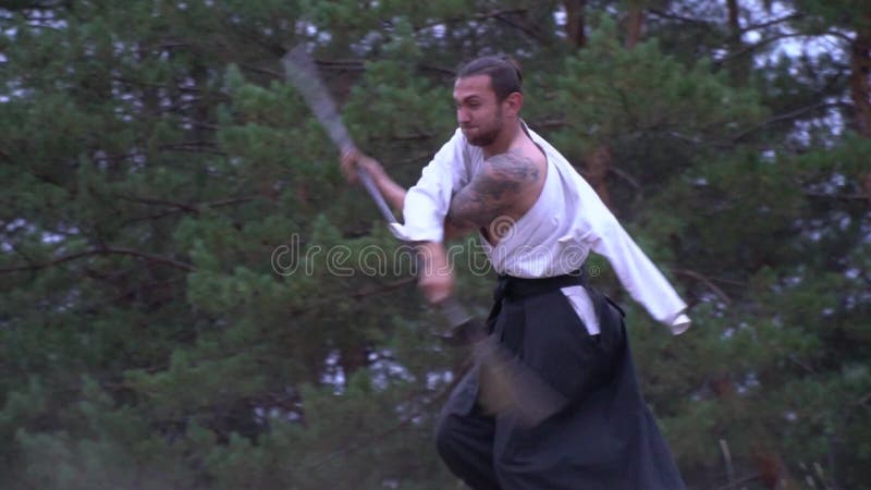 Samurai with a Halberd Skillfully Fighting Against a Warrior with a ...