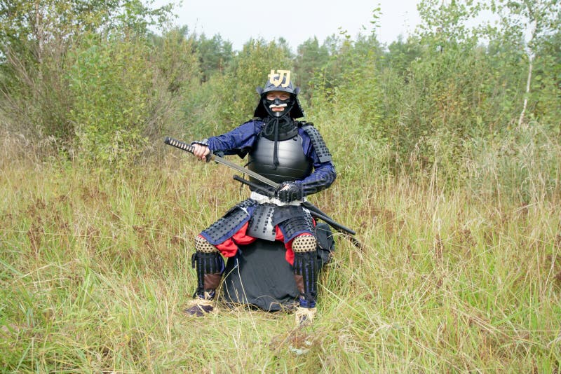 Samurai Pulling Out His Sword Stock Photo - Image of kabuto, armor ...