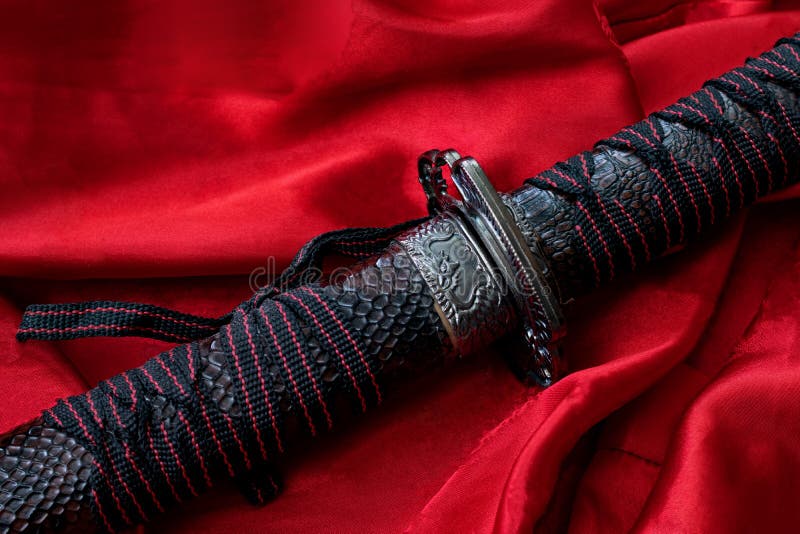 Samurai Sword on the Red Cloth Closeup Stock Photo - Image of fabric ...