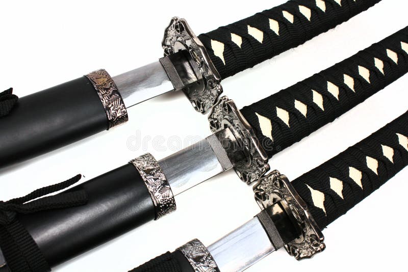Three Samurai Swords Hang on Wall Next To Table Stock Image - Image of ...