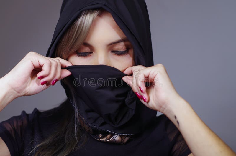 Samurai Woman Dressed in Black, Holding Matching Veil Adjusting Using ...