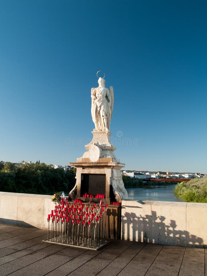 San Rafael Archangel Statue, Cordoba, Spain Stock Photo - Image of blue ...