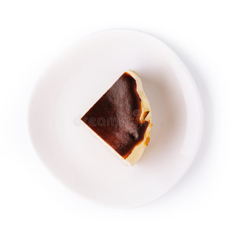 San Sebastian Cheesecake on Plate Stock Photo - Image of delicious ...