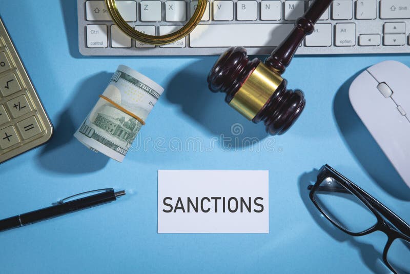 Sanctions on Business Card with a Money and Business Objects Stock ...