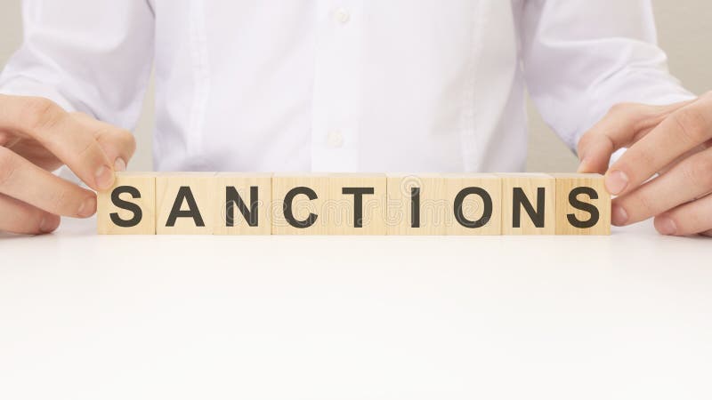 Sanctions Word Made With Wooden Building Blocks Business And Sell