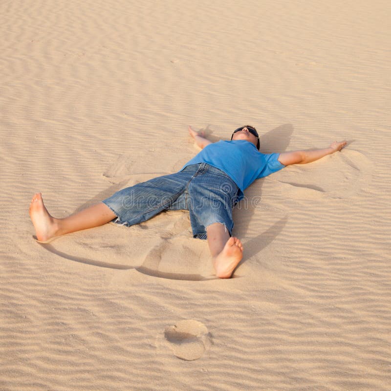 Sand angel stock photo. Image of angel, game, making - 20791292