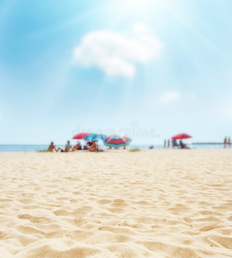 Sand on Beach Closeup and Sun in Blue Sky Stock Photo - Image of focus ...
