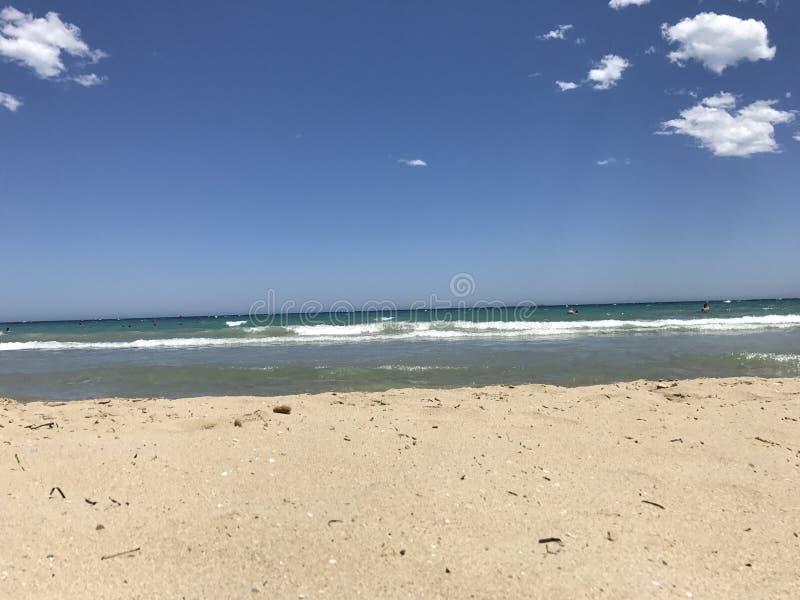 Sand at the beach front stock image. Image of front, couple - 98458139
