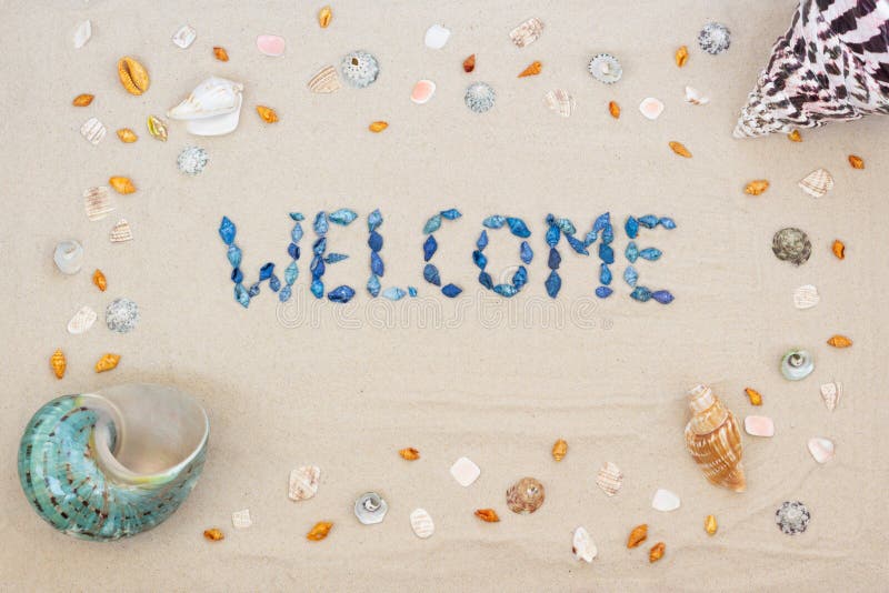 Sand on the Beach in Summer, the Inscription Welcome from the Shells on ...
