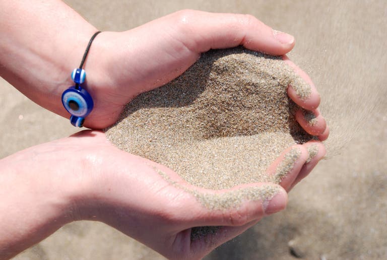 Sand in beautiful hands stock photo. Image of despair - 9882488