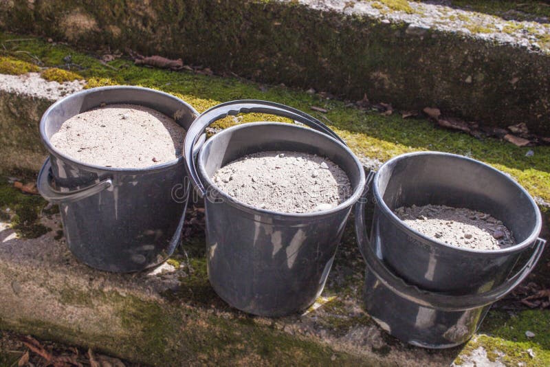 Sand buckets stock image. Image of yellow, bucket, buckets - 55467501