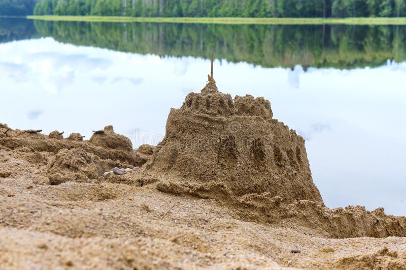 Sand Building on the Beach, Sand Castle on the Shore of the Pond Stock ...