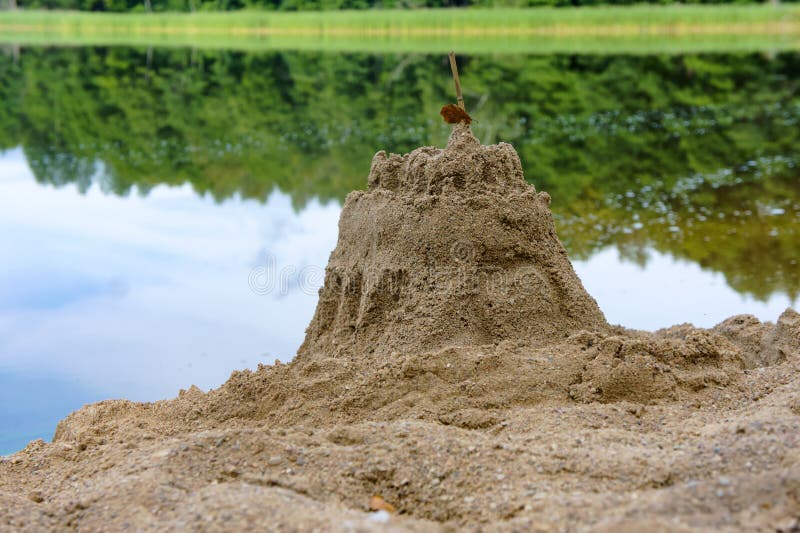 Sand Building on the Beach, Sand Castle on the Shore of the Pond Stock ...
