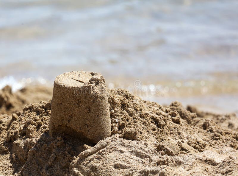 Sand building on the beach stock photo. Image of castle - 198355664