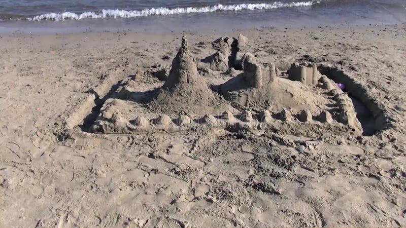 Sandcastles Building on the Foreshore at the Beach. Stock Footage ...