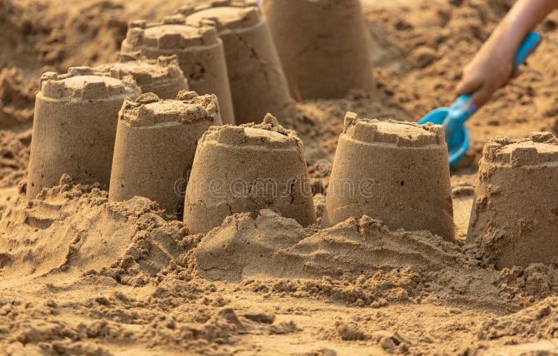 Sand Buildings on the Beach Stock Photo - Image of building, water ...