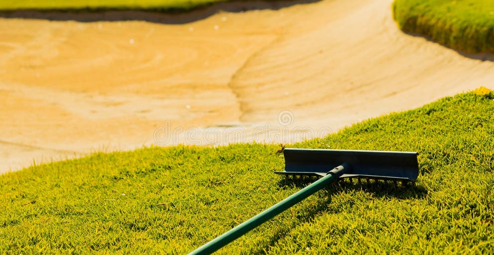 Sand Bunker Hazard and Rake on Golf Course Fairway Stock Image - Image ...