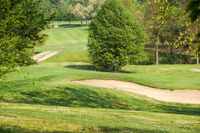 Sand Bunkers on the Golf Course Hill Stock Photo - Image of green ...
