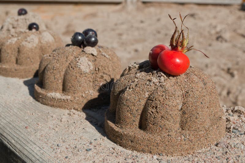 Sand cakes stock photo. Image of playing, childhood, playground - 77904026