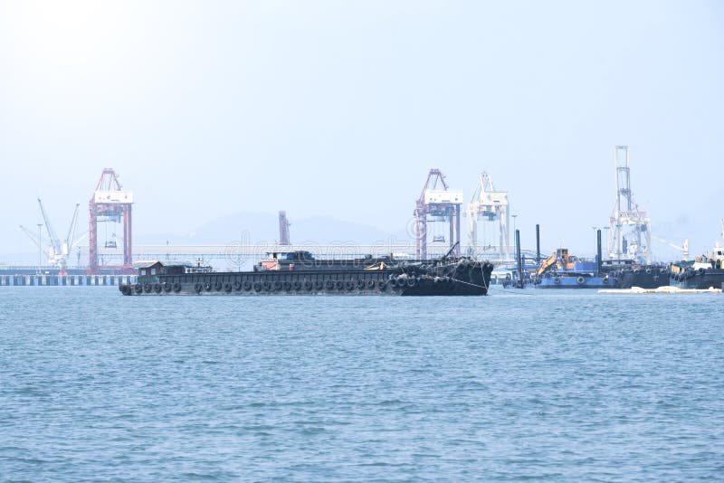 Sand Transshipment Operations from Bulk Carrier Vessel Anchored To ...