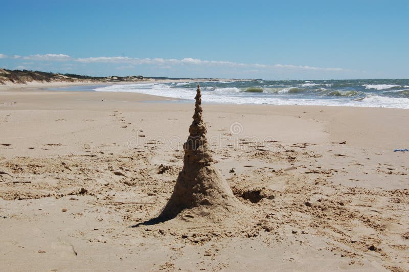 Pyramid Shaped Sand Castle stock photo. Image of sand - 3415540