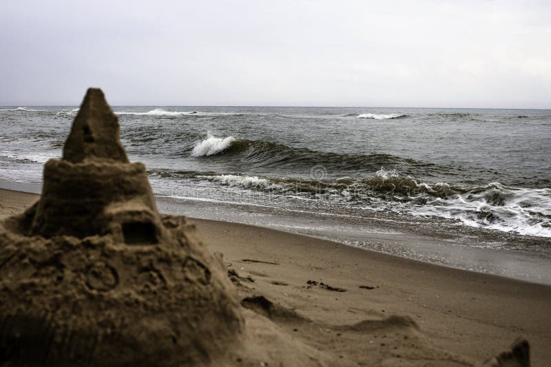 Sand Castle on the Background of the Waves Stock Image - Image of ...
