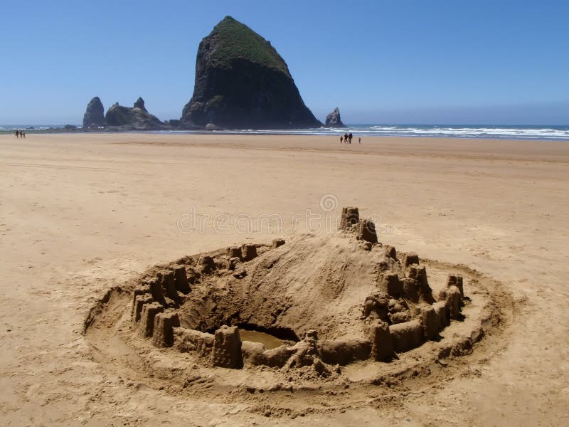Sand castle on ocean beach stock image. Image of monolith - 5856213