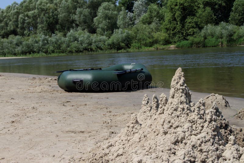 A Sand Castle and a Rubber Boat. Stock Image - Image of river, forest ...