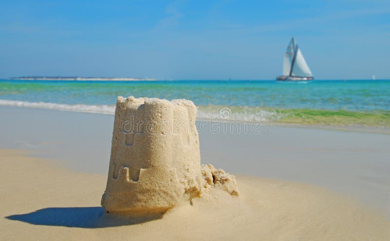 Sand Castle and Sailboat stock photo. Image of tropic - 3017076