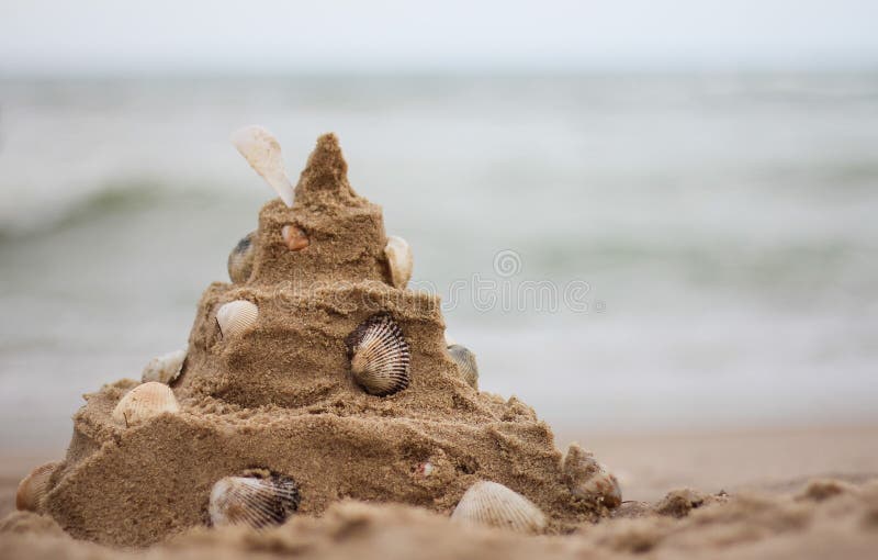 Sand castle stock photo. Image of shell, play, building - 56930888