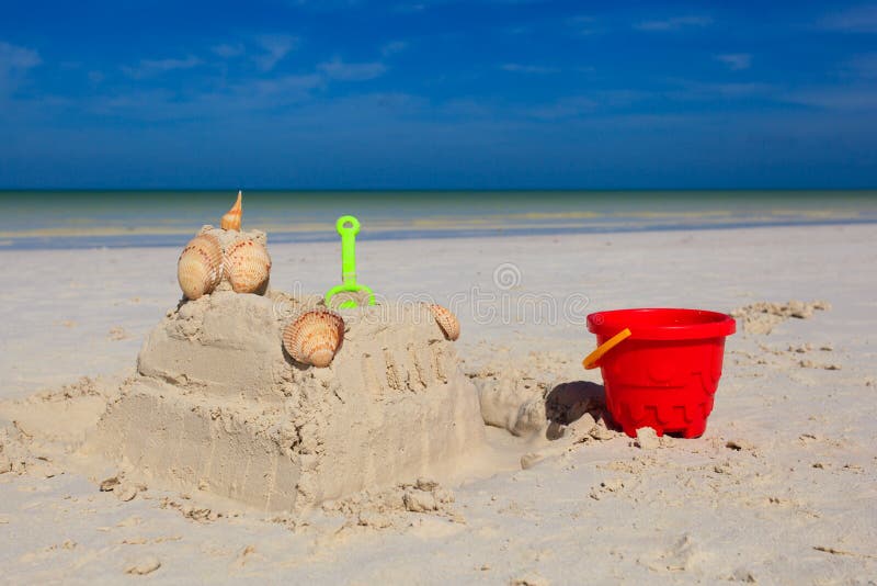 Sand Castle with Shells Built on Tropical Beach Stock Photo - Image of ...
