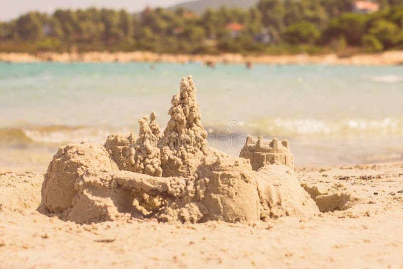 Sand castle on the beach stock image. Image of build - 107947205