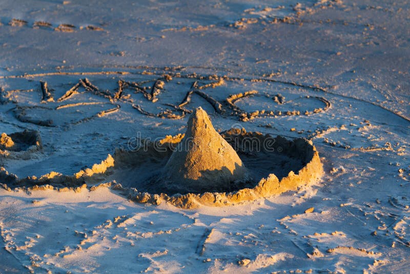 Sand Castle with Wall on Beach at Sunset Stock Image - Image of castle ...