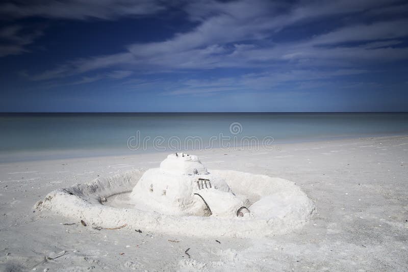 Sand Castle on White Sand Beach Stock Image - Image of sandy, surf ...