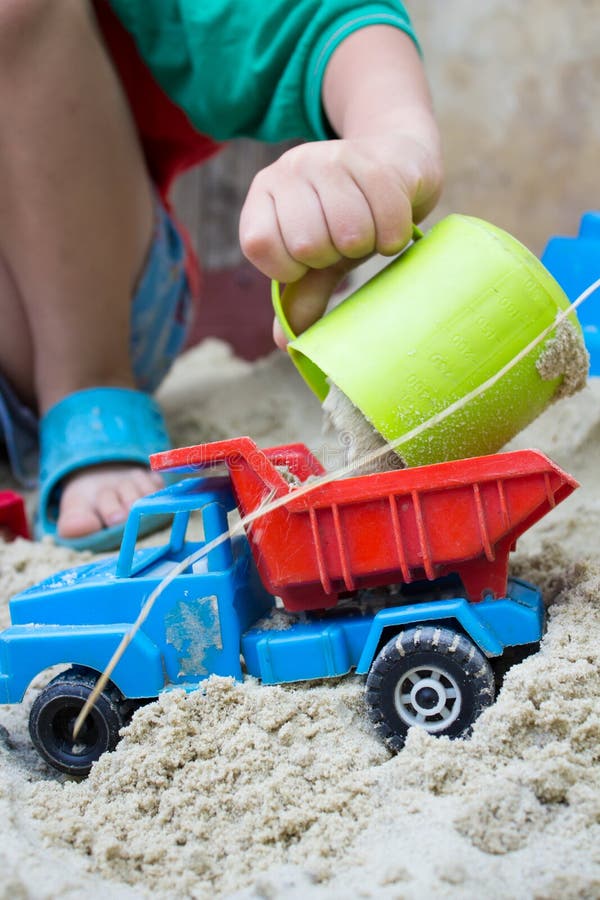 Sand for children s car stock photo. Image of boys, play - 50814510