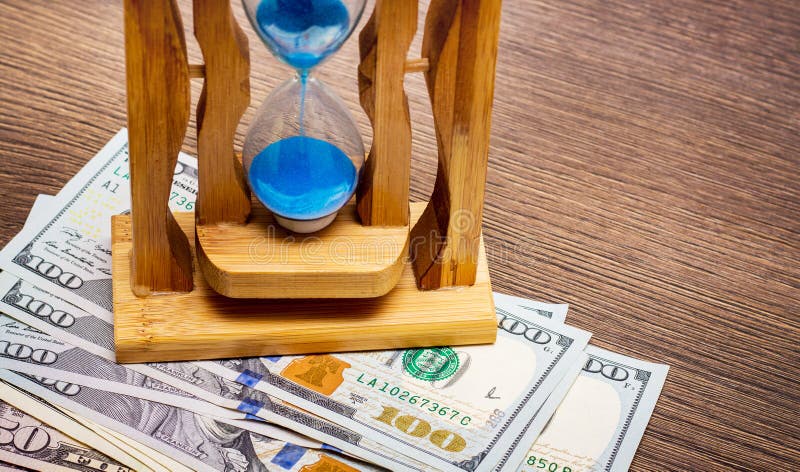 The Sand Clock on Dollar Bills. Time To Earn Money. Time is Money ...