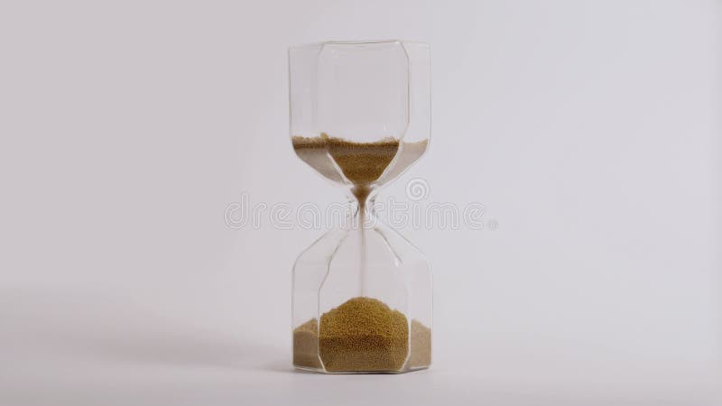 Sand clock measuring time stock footage. Video of deadline - 231625920