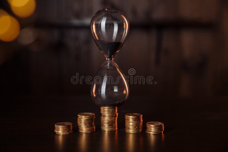 Sand Clock with Stack of Coins. Time is Money, Investment Concept Stock ...